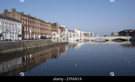 Urban cityscape of cork city river lee and Saint particks bridge ...