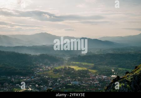 View of the mist-covered mountains of Tana Toraja seen from the top of ...