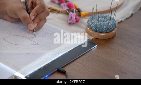 Tracing Designs with LED Light Pad for a Hand Embroidery Project Stock ...
