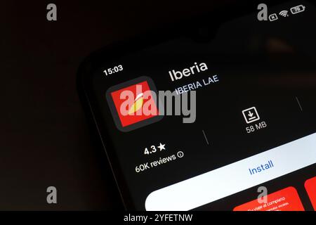 In this photo illustration an Iberia logo of an airline of Spain is ...