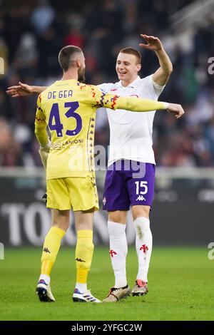 Pietro Comuzzo of ACF Fiorentina celebrates with team mates after ...