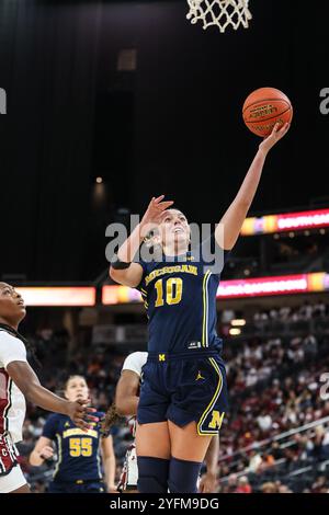 Michigan guard Jordan Hobbs (10), right, celebrates with center Yulia ...