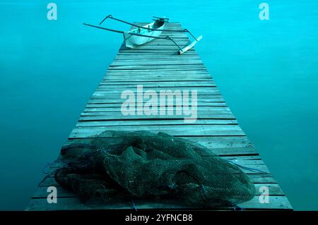 Cadik Boat, a traditional Indonesian small wooden fisherman boat at ...