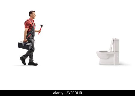 Plumber walking towards a toilet with a plunger and drain snake ...