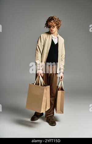 This is my Friday outfit. Studio portrait of a handsome young man ...