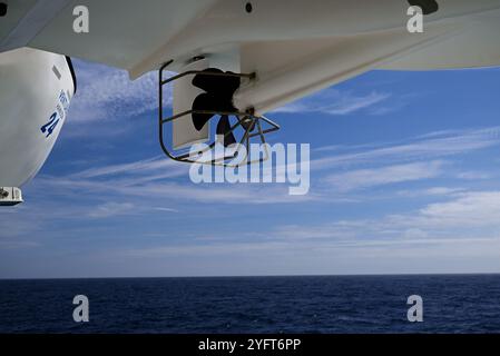 Under the lifeboats on the promenade deck of P&O cruise ship Ventura at ...
