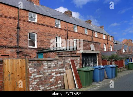 Terraced house with recycling bins in foreground Stock Photo - Alamy