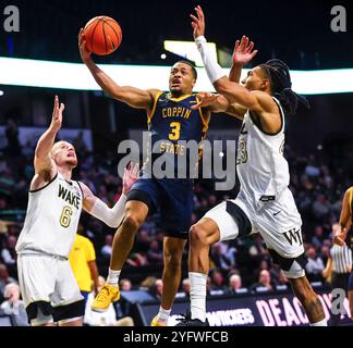 Wake Forest guard Cameron Hildreth (2) defends Duke guard Trevor Keels ...
