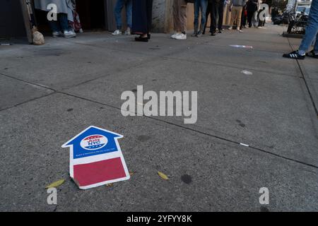 A sticker of President Donald J. Trump points to the electronically ...