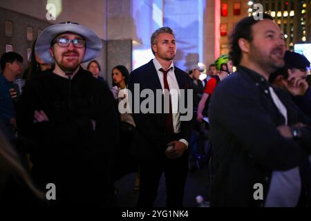 Liberal supporters watch election results broadcast at the Liberal ...