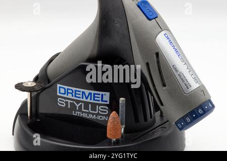 Dremel Stylus Lithium-ion drill on recharger base Stock Photo - Alamy