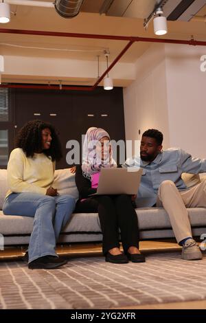 Group of smiling multiracial coworkers in stylish wear taking self ...