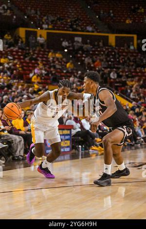 Arizona State guard Alston Mason, left, drives against Texas Tech guard ...