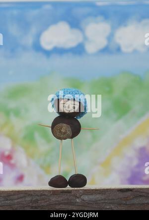 Chestnut figure with hat in the studio Stock Photo - Alamy