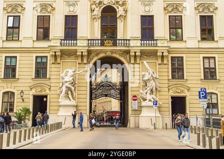 Vienna, Austria - April, 2, 2015: Arch and building view and tourists ...