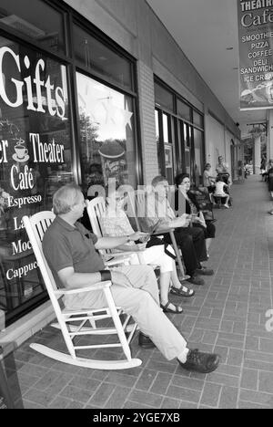 Stock photo shows Caucasian senior couple reading information from the ...