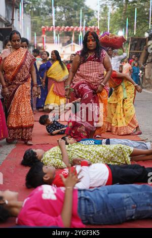 Kolkata, India - Nov 7, 2024: Hindu devotees gathered along the Hooghly ...