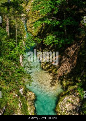 vertical format image of Gorge Creek Falls, a long beautiful waterfall ...