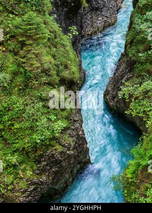 vertical format image of Gorge Creek Falls, a long beautiful waterfall ...