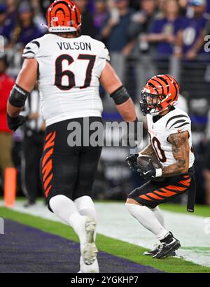 Cincinnati Bengals running back Chase Brown (30) is tackled by ...