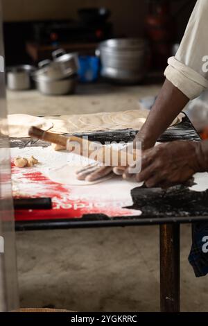 South indian man making chapati Stock Photo - Alamy