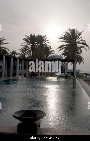 swimming pool at dusk the chedi hotel muscat oman middle east Stock ...