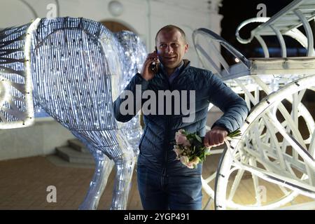 People walk past the Love Sculpture in Philadelphia, Monday, June 15 ...