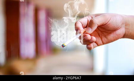The dangers of smoking, symbol Stock Photo - Alamy