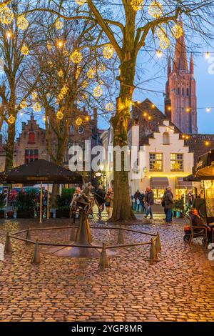 Cobbled square with decorations at night Stock Photo - Alamy