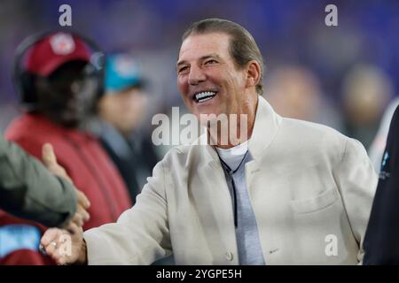 Baltimore Ravens owner Steve Bisciotti walks on the field before an NFL ...