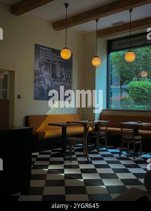 Cozy vintage style coffee shop interior with a white brick wall Stock ...