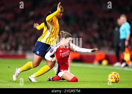 Brighton and Hove Albion's Madison Haley heads the ball clear under ...