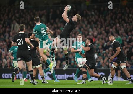 New Zealand's Damian McKenzie (centre) celebrates with team-mates after ...