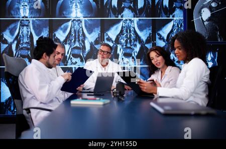 Doctors Screening X Ray Images And MRI Scans Stock Photo - Alamy