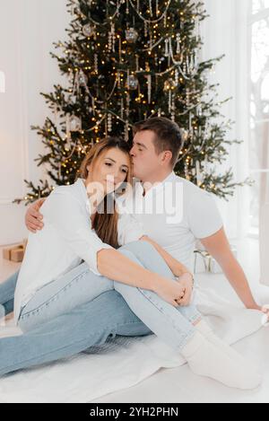Party, fun and holidays concept - young happy couple with sparklers on ...