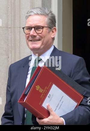 FILE -British Prime Minister Keir Starmer, left, and French President ...