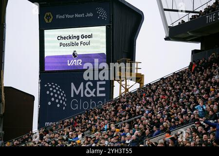 The giant screen displays a VAR message, ahead of confirming a penalty ...
