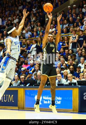 Duke guard Caleb Foster shoots over Houston guard Milos Uzan during the ...