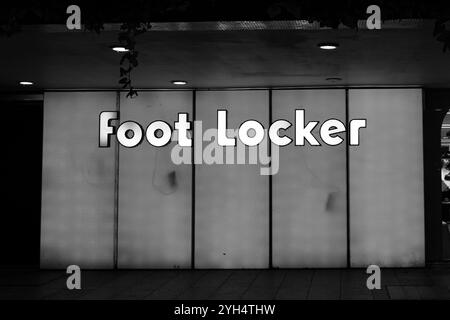 Sign at the entrance to a Foot Locker store in Midtown Manhattan ...
