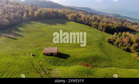 Aerial landscape of Appennini colorfull hills and woods during a sunny ...