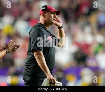Alabama head coach Kalen DeBoer, right, talks with officials on the ...