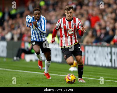 Sheffield United's Harrison Burrows (left) celebrates scoring their ...