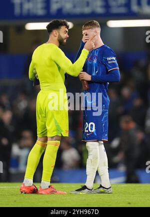 Arsenal goalkeeper David Raya (left) and Liverpool goalkeeper Alisson ...