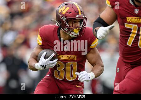 Washington Commanders running back Austin Ekeler (30) warms up before ...