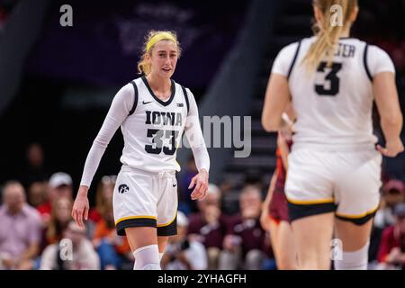 Iowa guard Lucy Olsen (33) looks to shoot as Murray State guard Haven ...