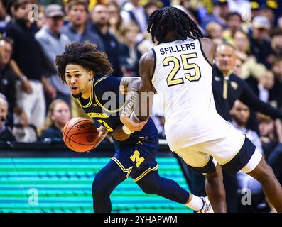 Michigan guard Tre Donaldson drives to the basket against Oklahoma ...