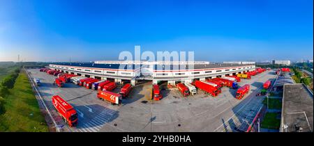KUNSHAN, CHINA - NOVEMBER 11, 2024 - Multiple express logistics trucks ...