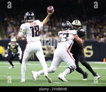 Atlanta Falcons guard Chris Lindstrom (63) walks off the field after an ...