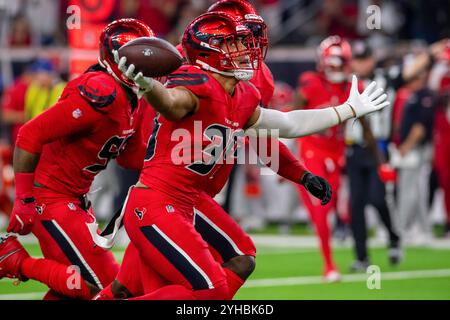 Houston Texans linebacker Henry To'oTo'o, left, and defensive end ...