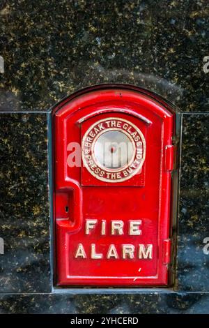 Fire alarm press here box on wall Stock Photo - Alamy